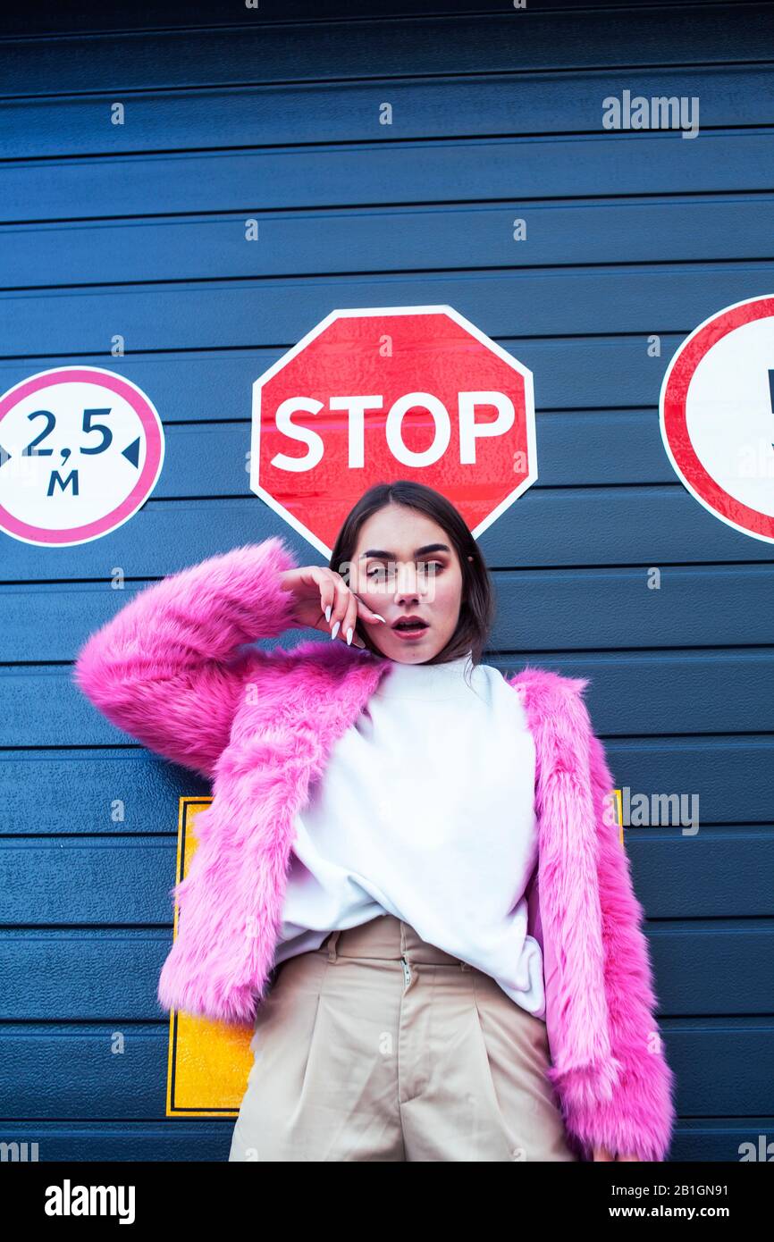 young cute girl teenager gesturing hanging around city parking and ...