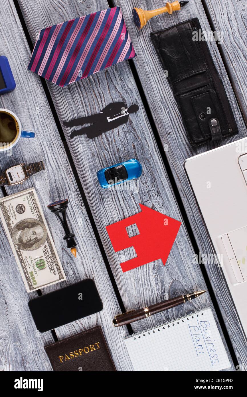 Mini models, personal stuff and laptop Stock Photo - Alamy