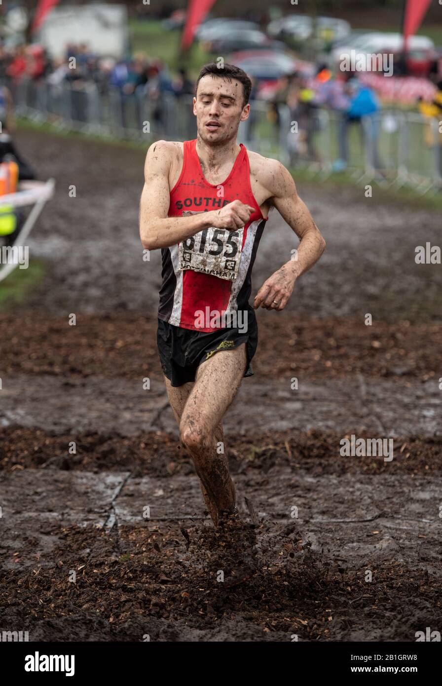 NOTTINGHAM - ENGLAND - 22 FEB, An exhausted Adam Hickey crossing the ...