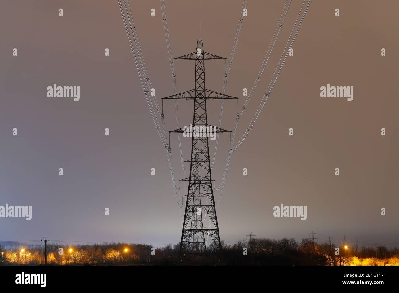 An electricity pylon at night, in Allerton Bywater near Castleford in ...