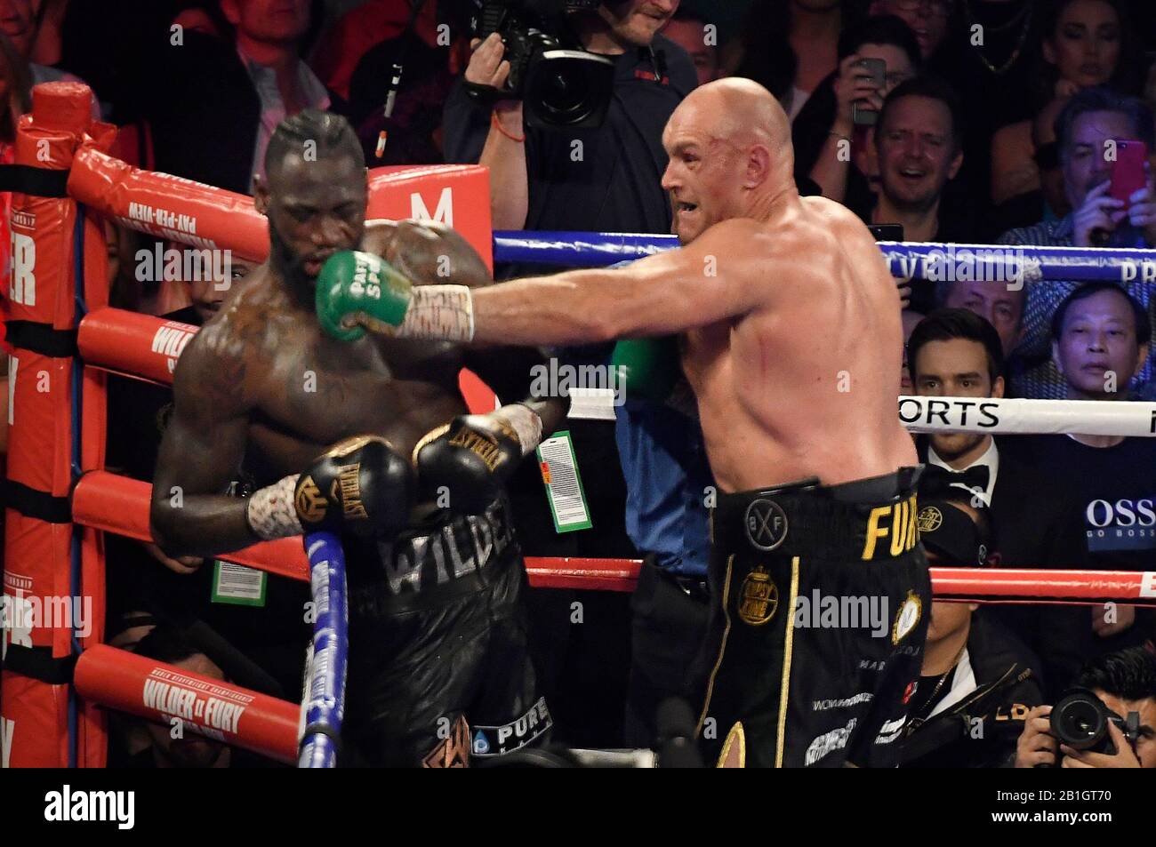LAS VEGAS, NV - FEBRUARY 22: (in black//yellow trunks) Tyson Fury goes ...