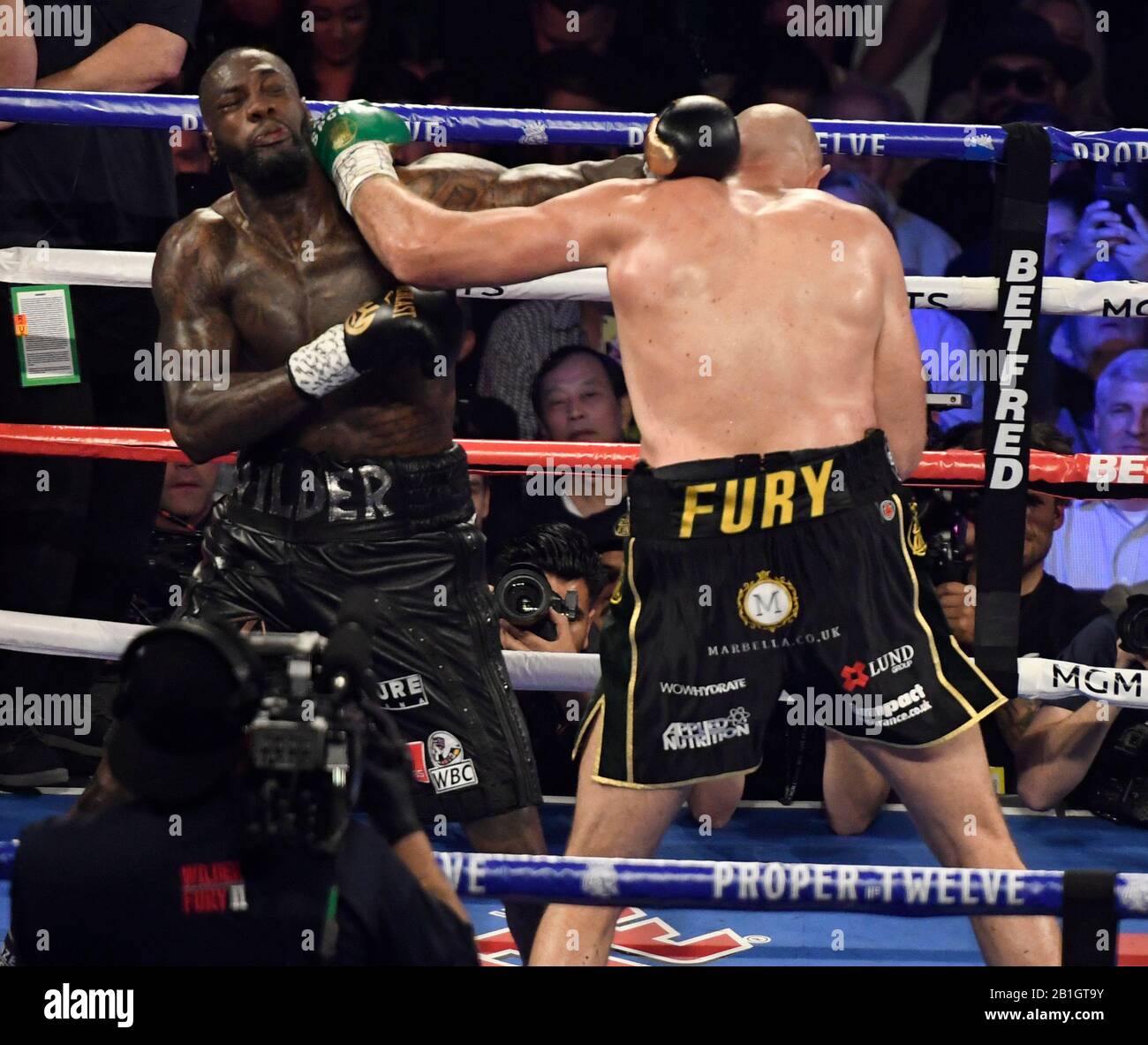LAS VEGAS, NV - FEBRUARY 22: (in black//yellow trunks) Tyson Fury goes ...