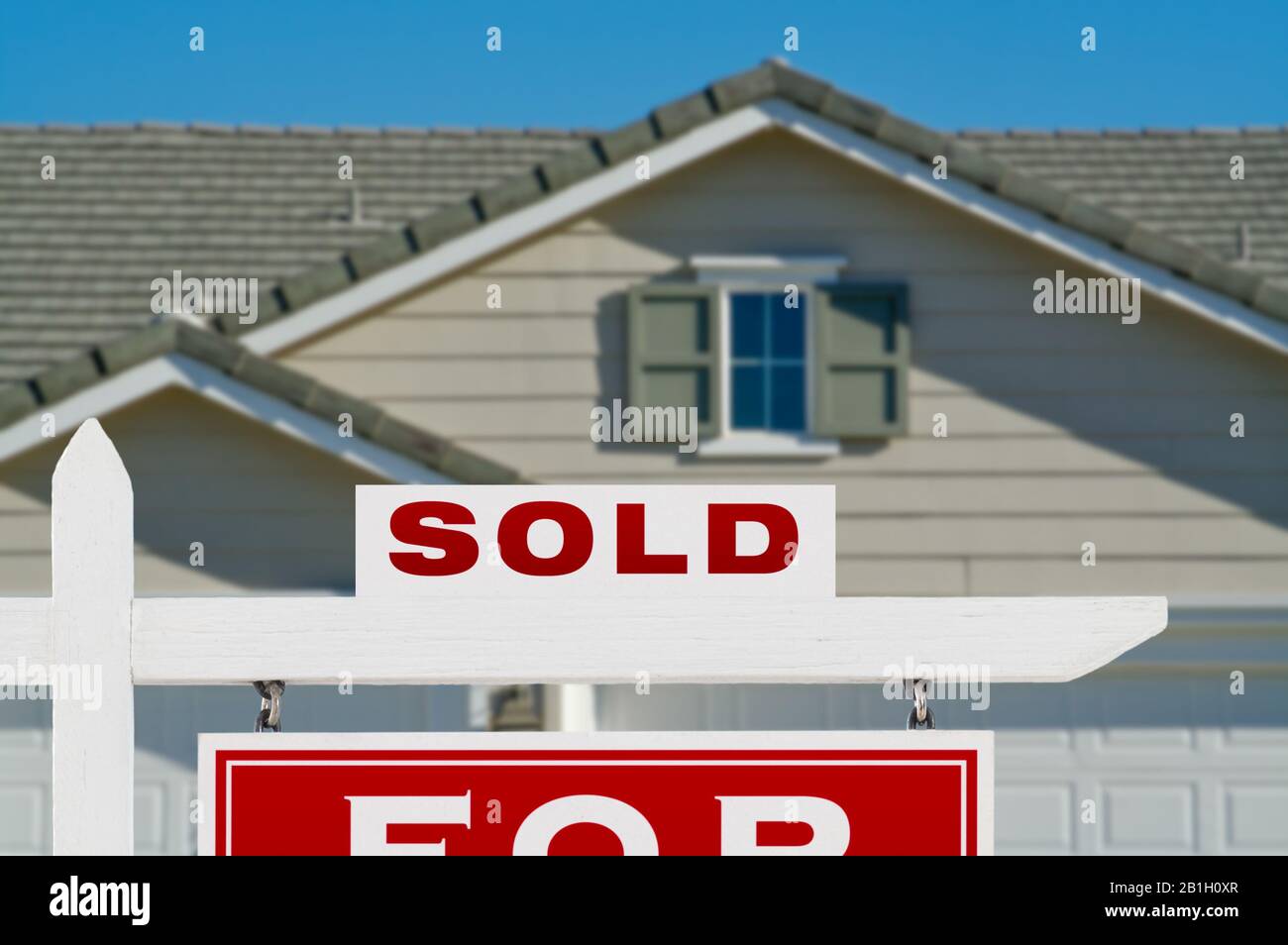 Sold Home For Sale Real Estate Sign and House Stock Photo - Alamy