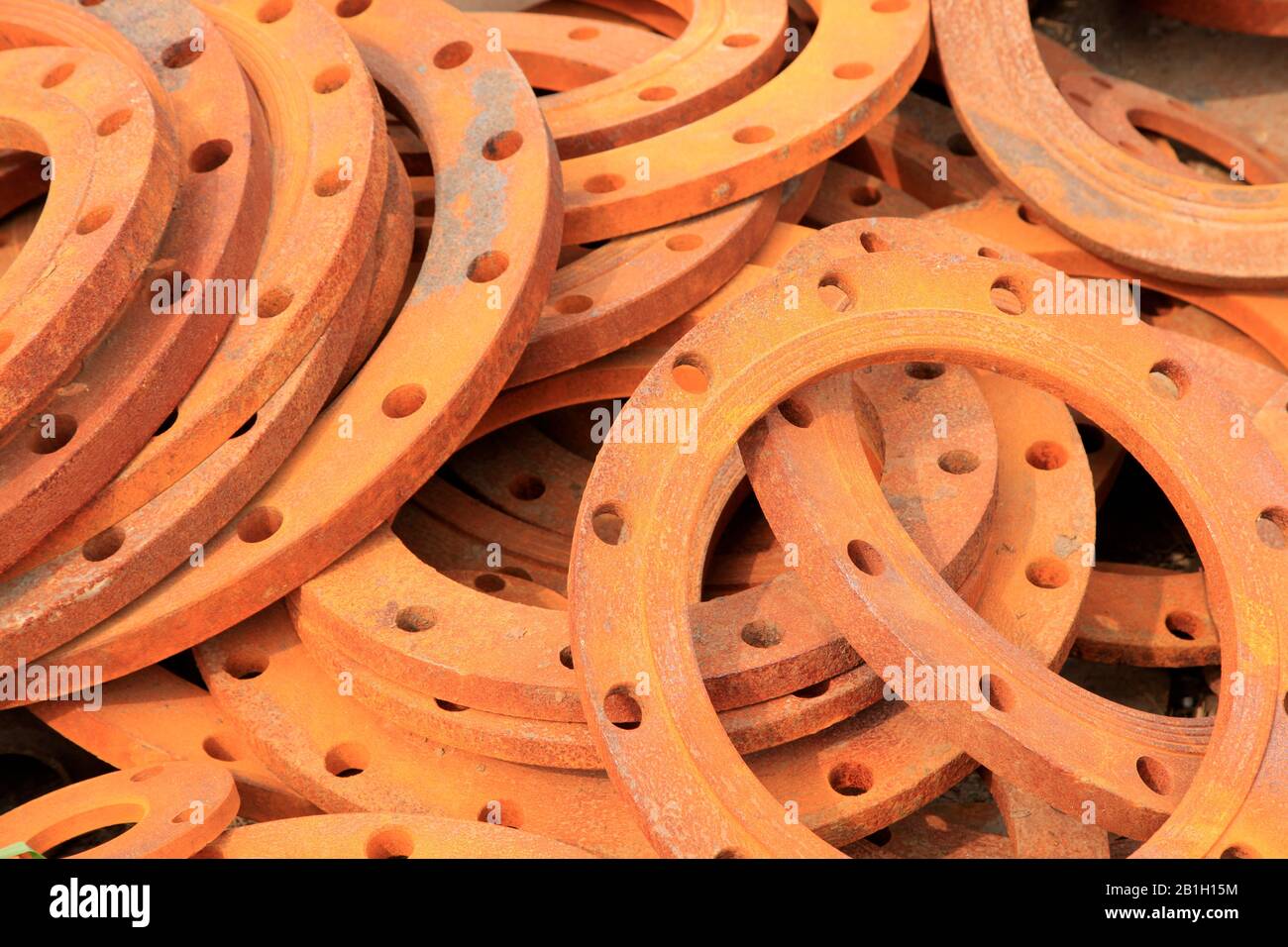 Pile up the old round steel Stock Photo - Alamy
