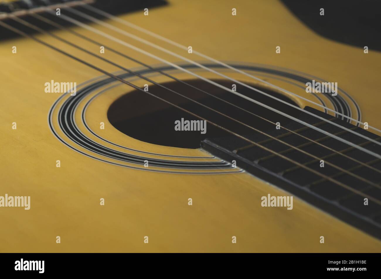 Acoustic guitar close up. musical instrument. strings on the guitar ...