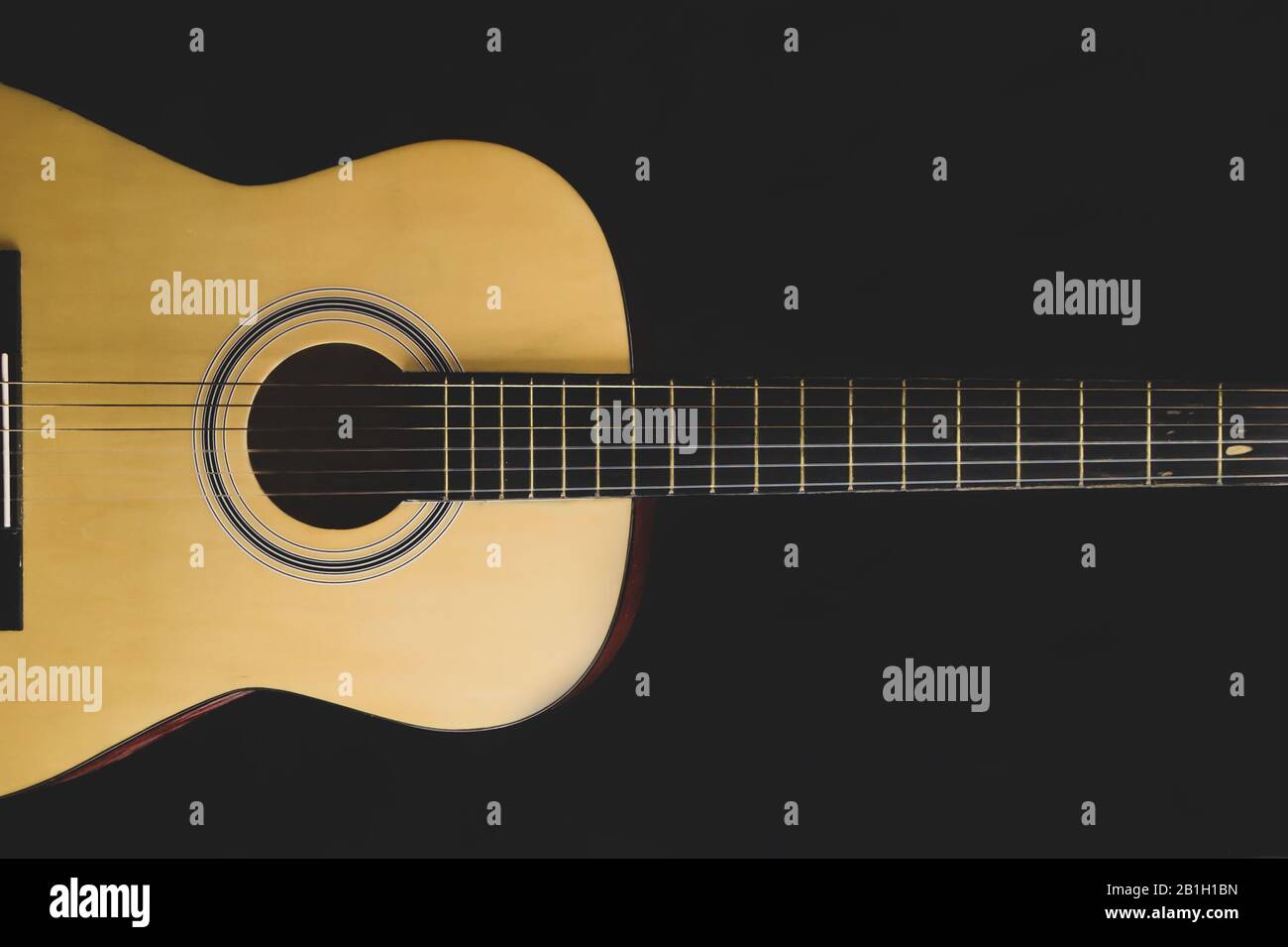 Guitar on the black background. acoustic musical instrument Stock Photo ...