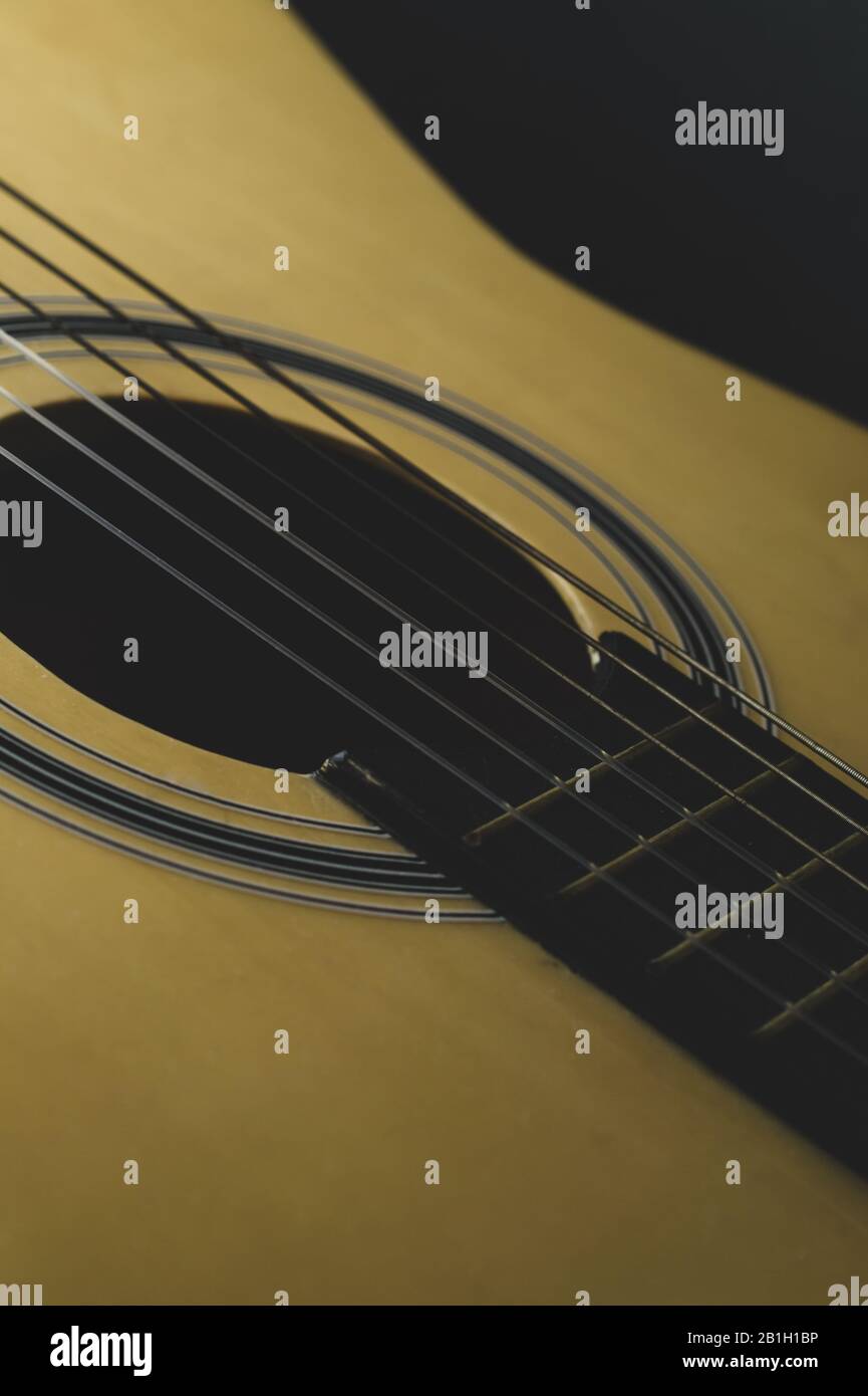 Acoustic guitar close up. musical instrument. strings on the guitar ...