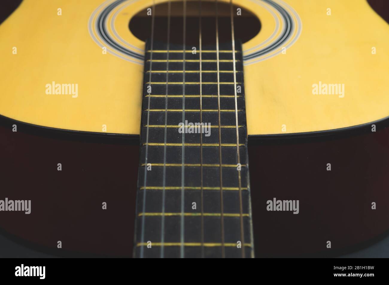 Acoustic guitar close up. musical instrument. strings on the guitar ...