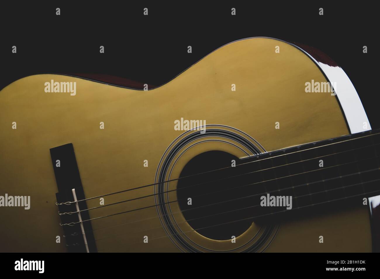 Guitar on the black background. acoustic musical instrument Stock Photo ...