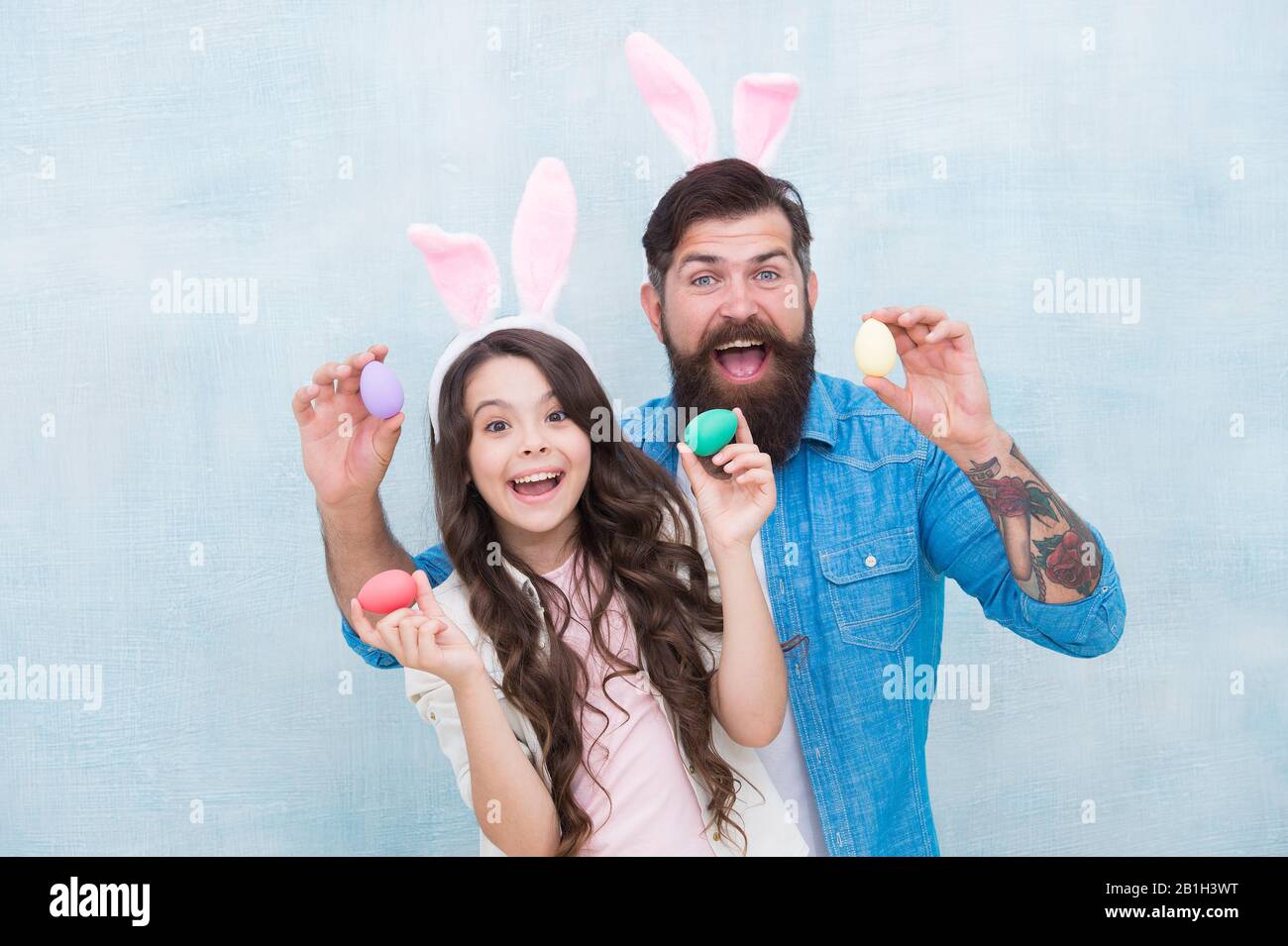 Feeling safe with dad. happy easter. funny dad and child girl wearing ...