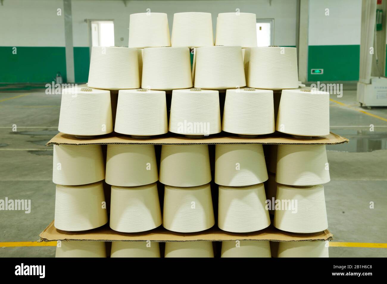 The textile workshop, spool piled up together, neat rows Stock Photo ...
