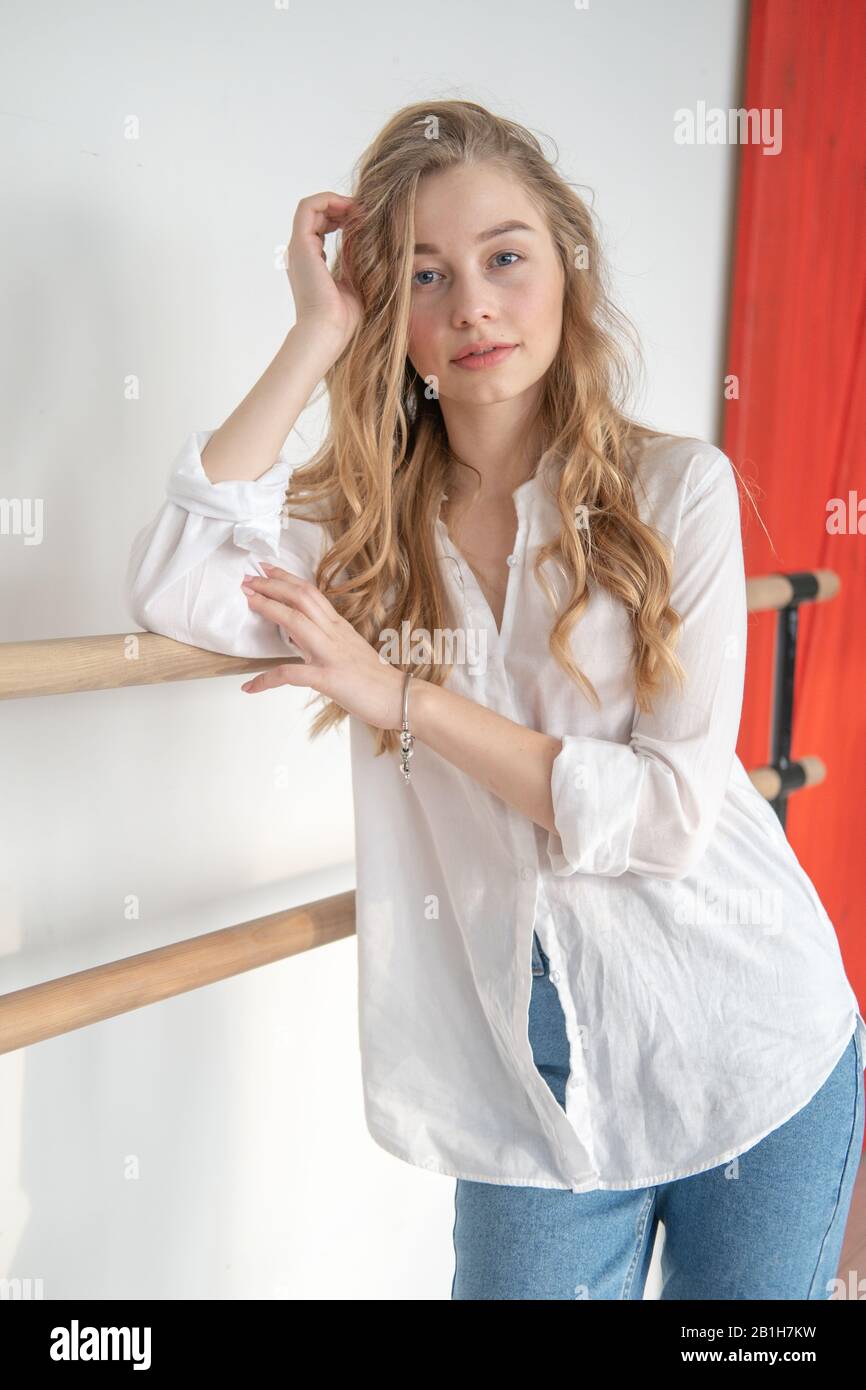 Tall slim young blond woman hi-res stock photography and images - Alamy