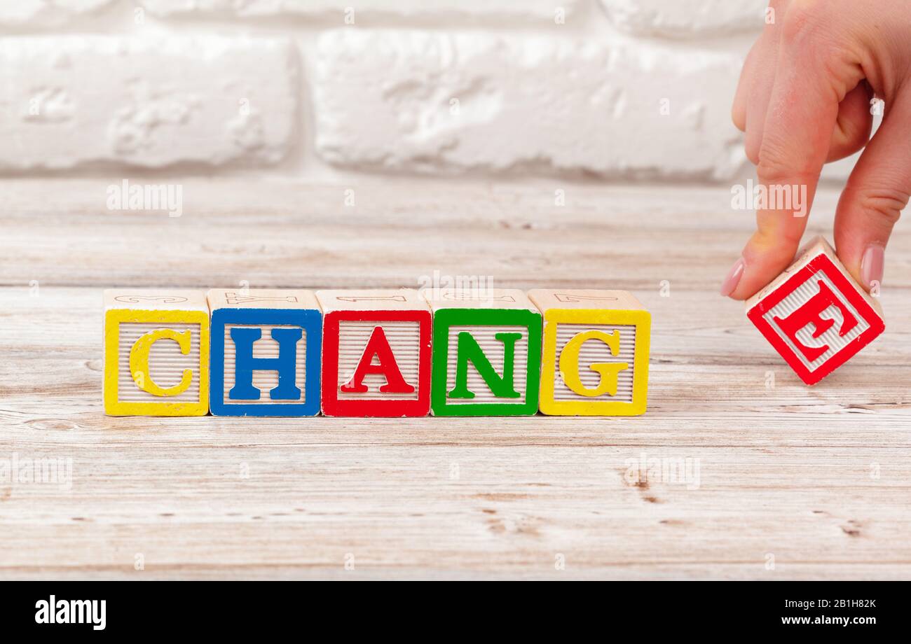 Change symbol wooden blocks hi-res stock photography and images - Alamy