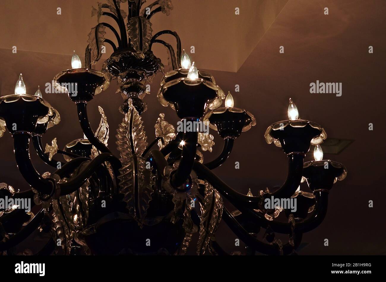 chandelier light up the room Stock Photo - Alamy