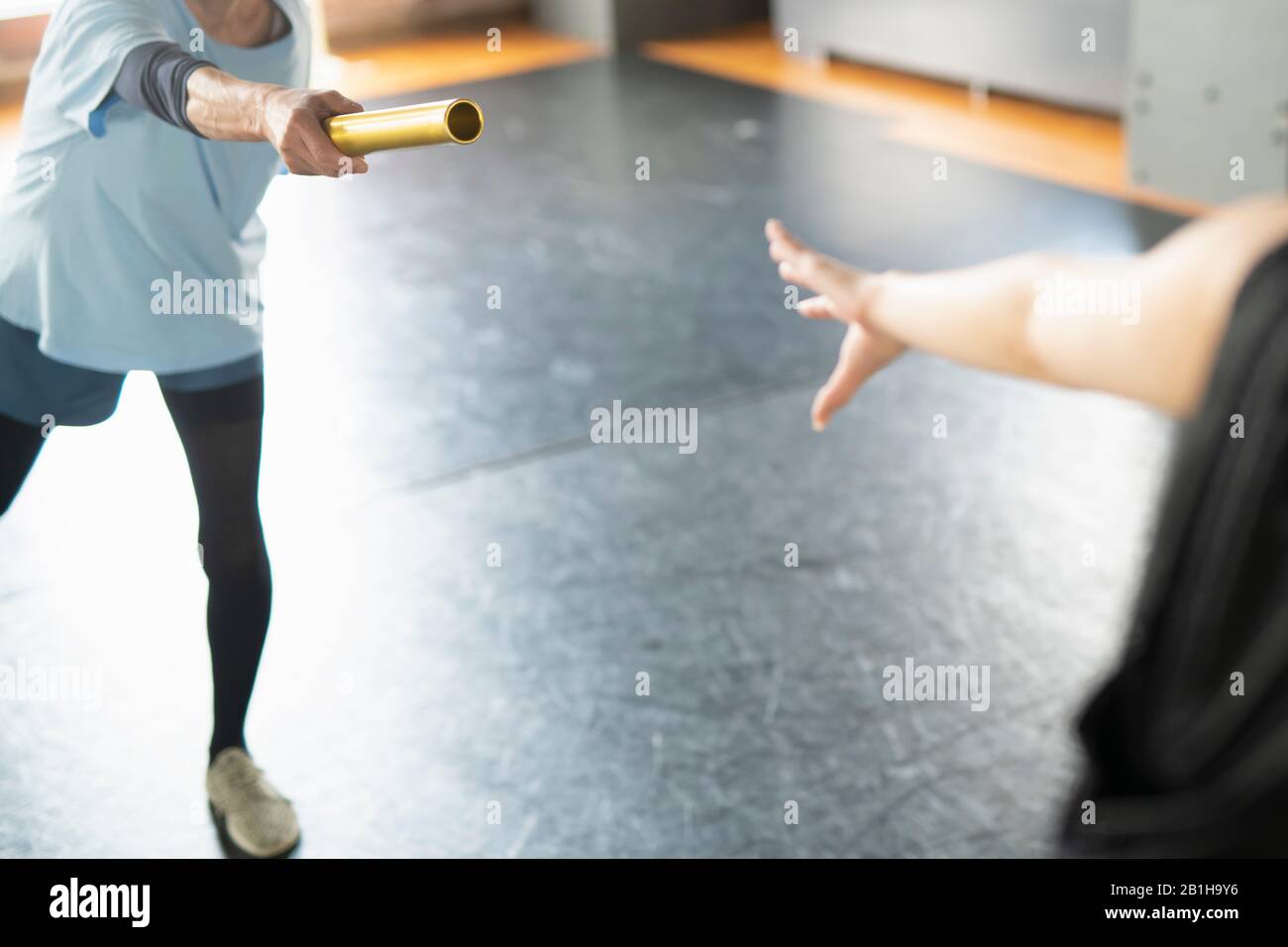 Passing the baton hi-res stock photography and images - Alamy