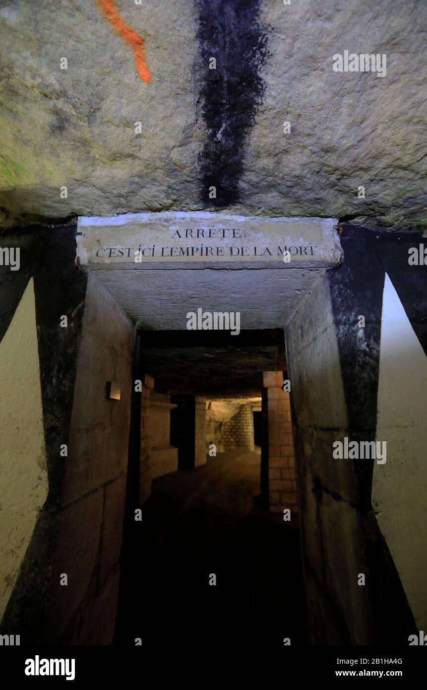 The underground entrance to the catacombs of Paris with the sign of ...