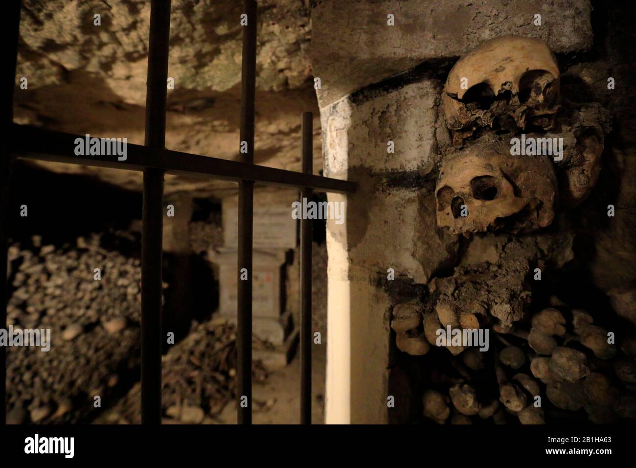Bones and skulls stored inside of the catacombs of Paris.Paris,France ...