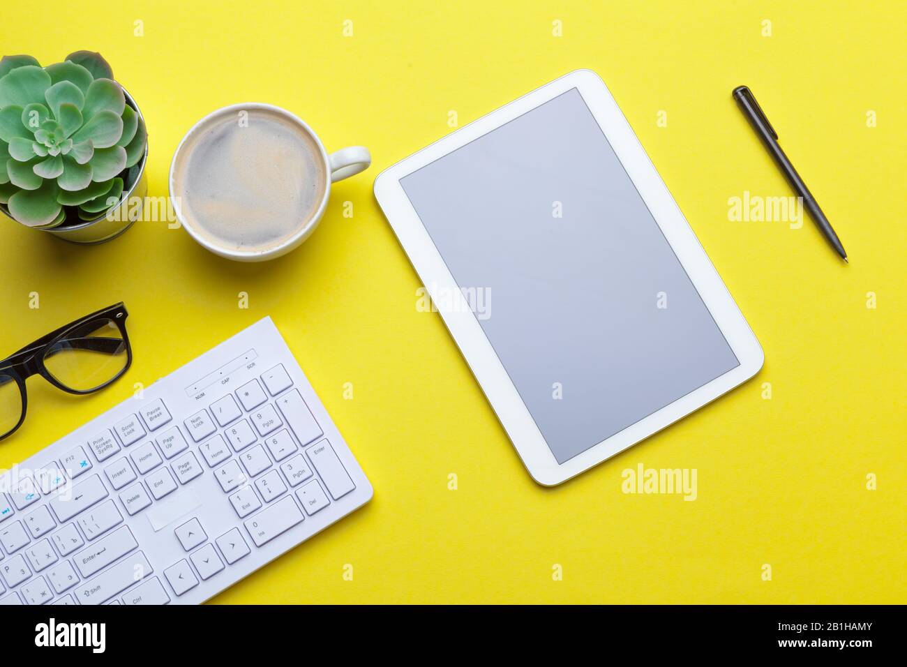 School stationery on a yellow table, background. Creative, educational ...