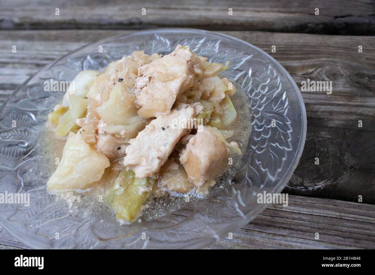 Filipino chicken adobo with cabbage and light sauce Stock Photo - Alamy