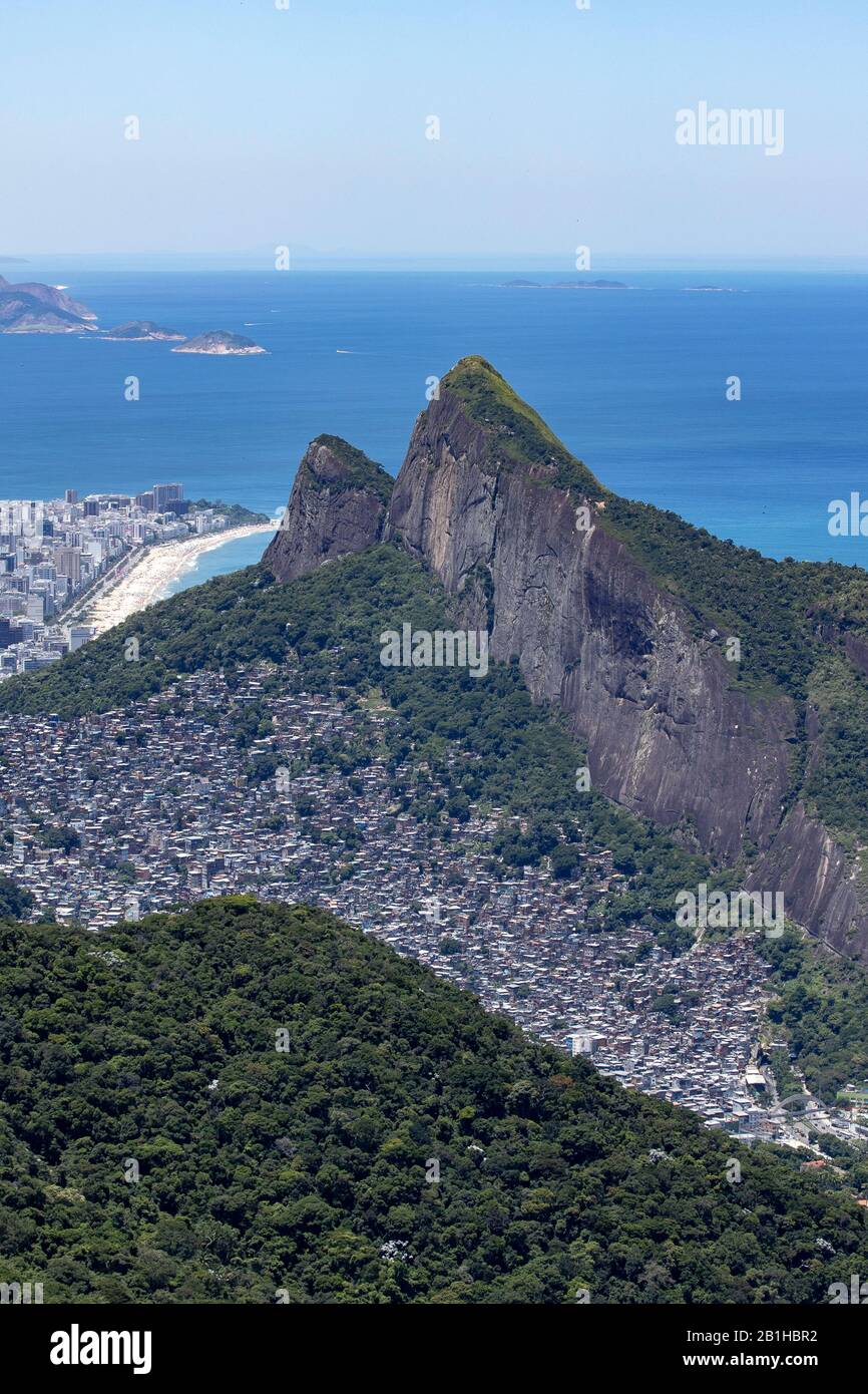Vertical frame of Two Brothers mountain with Rocinha shanty town in Rio ...