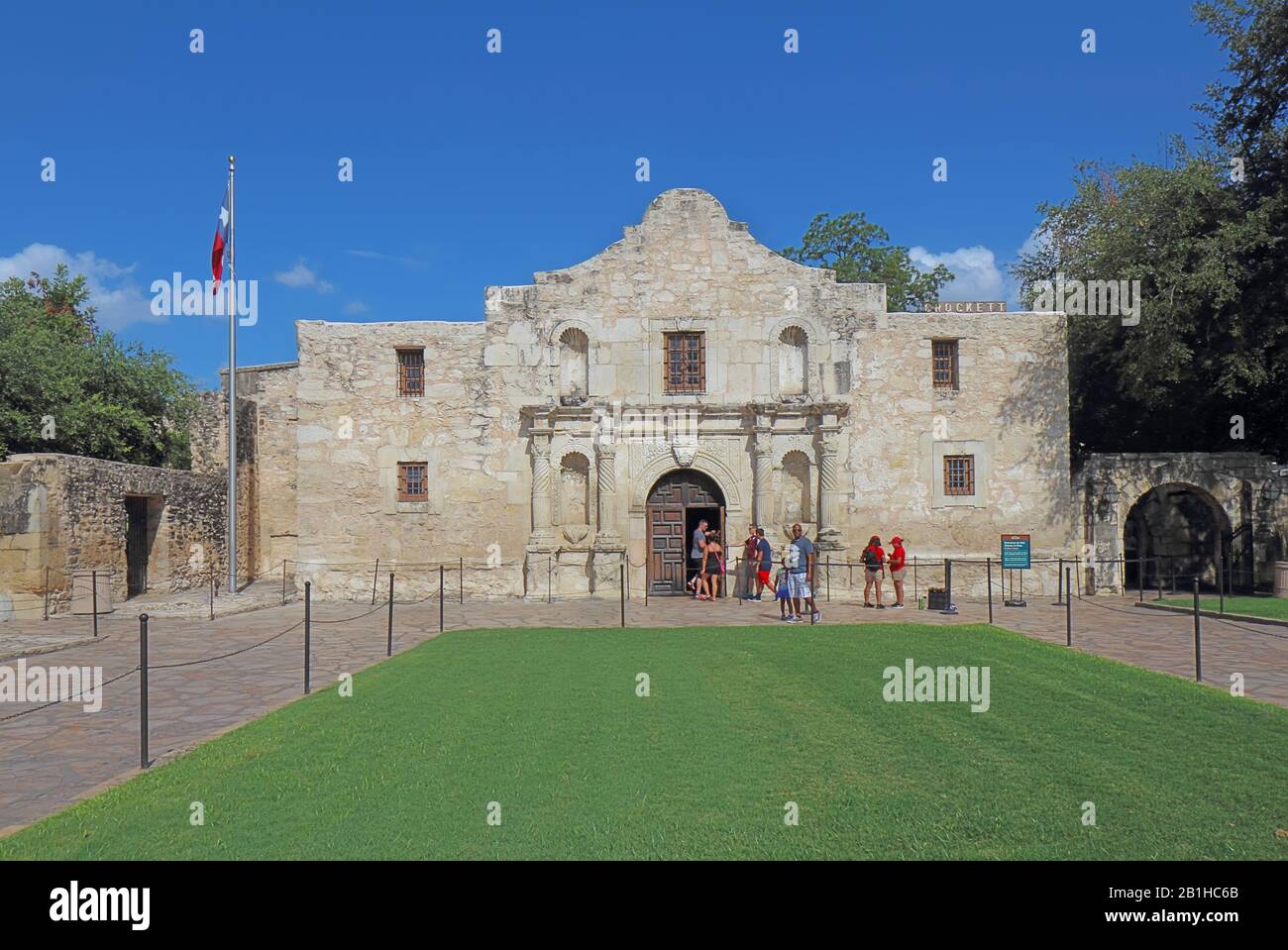 Tourists visiting the chapel at the Alamo Mission, the former Mision ...