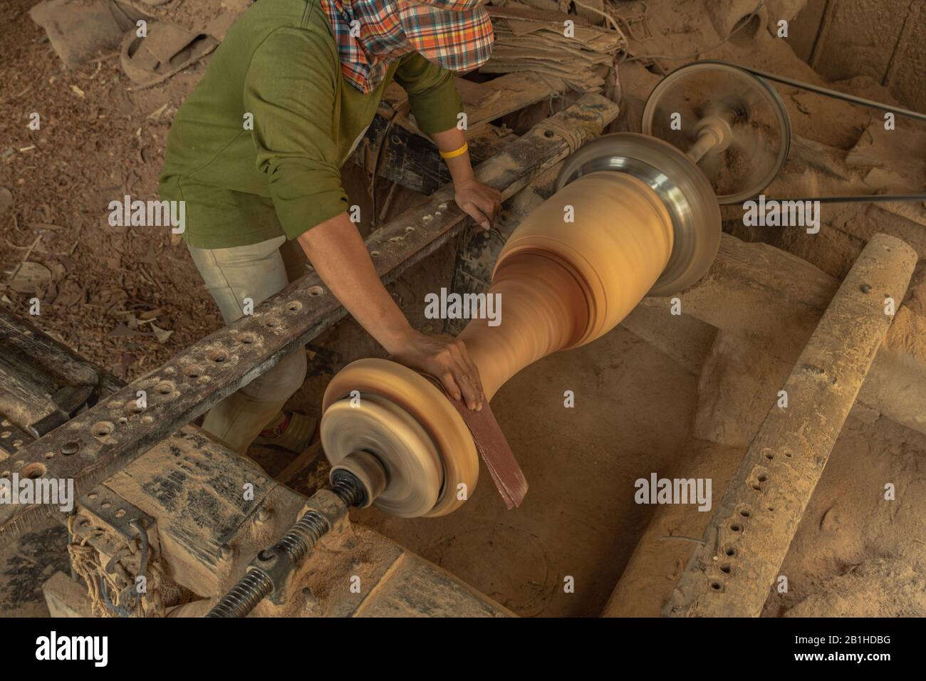 Long drum that has been machined into shape Long drums that are ...