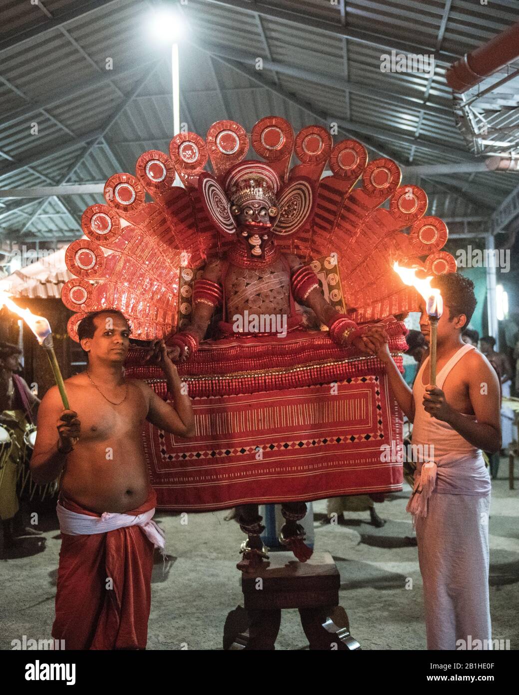 Theyyam performer, as a living god, dances a popular ritual form of ...