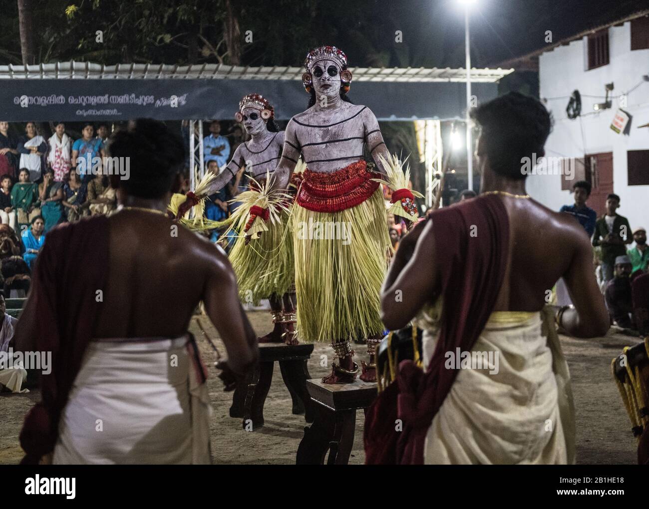 Theyyam performers dancing a popular ritual form of worship in North ...