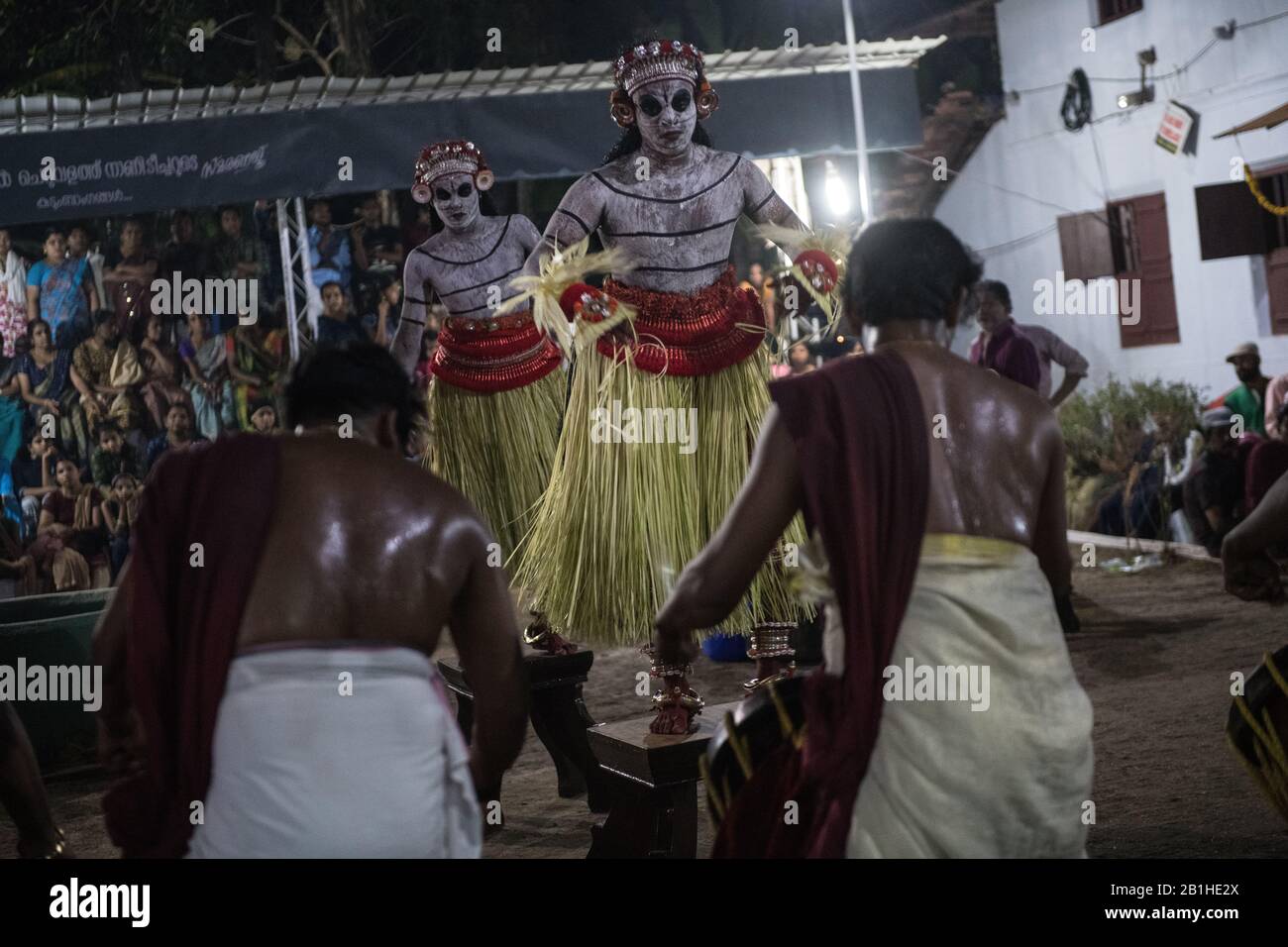 Theyyam performers dancing a popular ritual form of worship in North ...