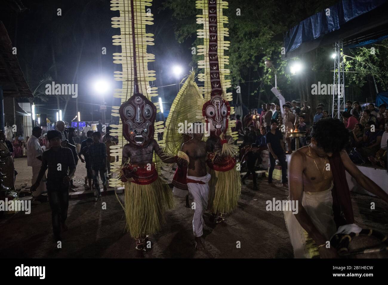 Theyyam performers dancing a popular ritual form of worship in North ...