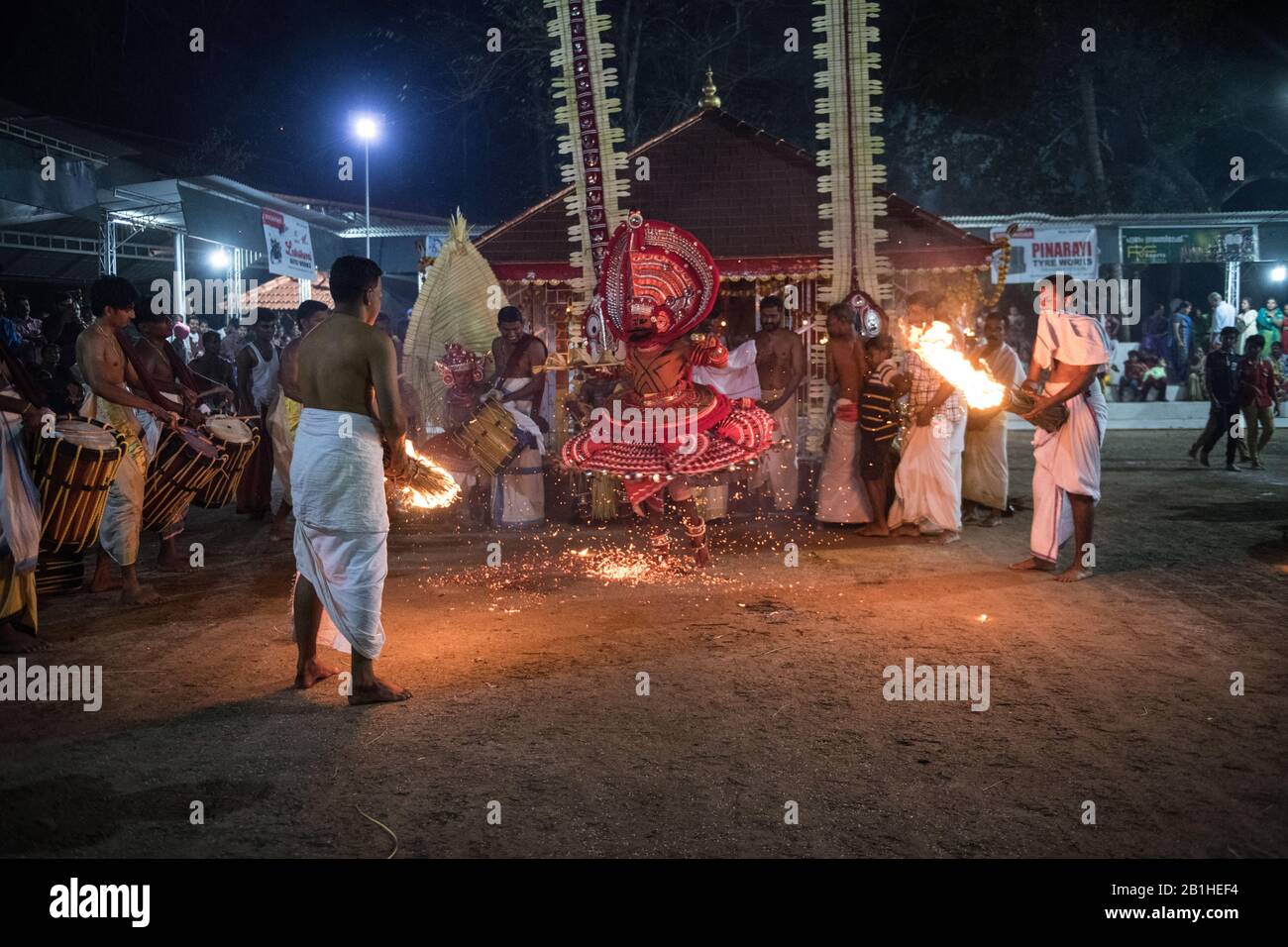 Theyyam performer, as a living god, dances a popular ritual form of ...