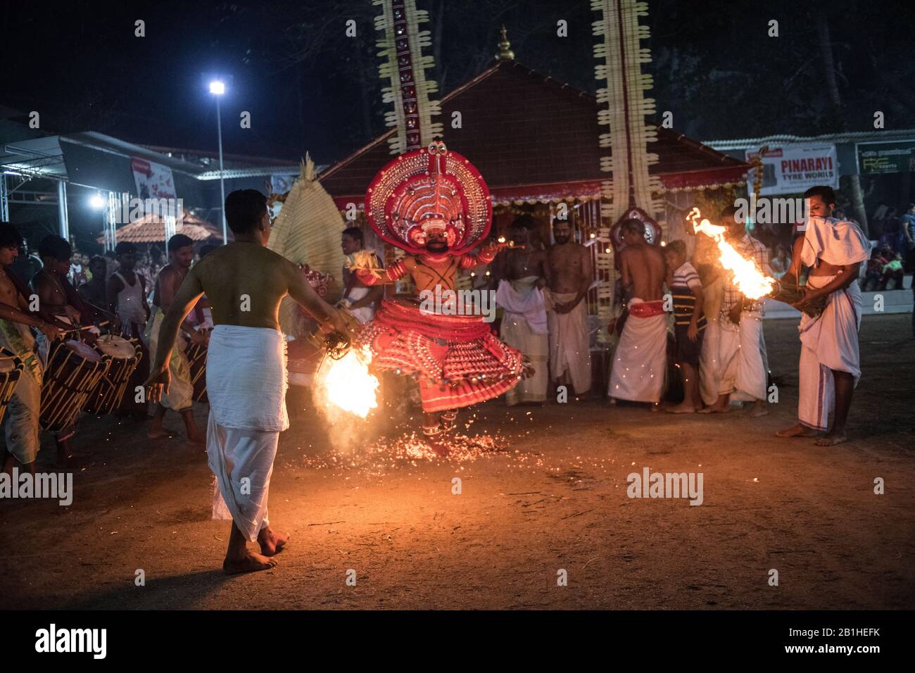 Theyyam performer, as a living god, dances a popular ritual form of ...