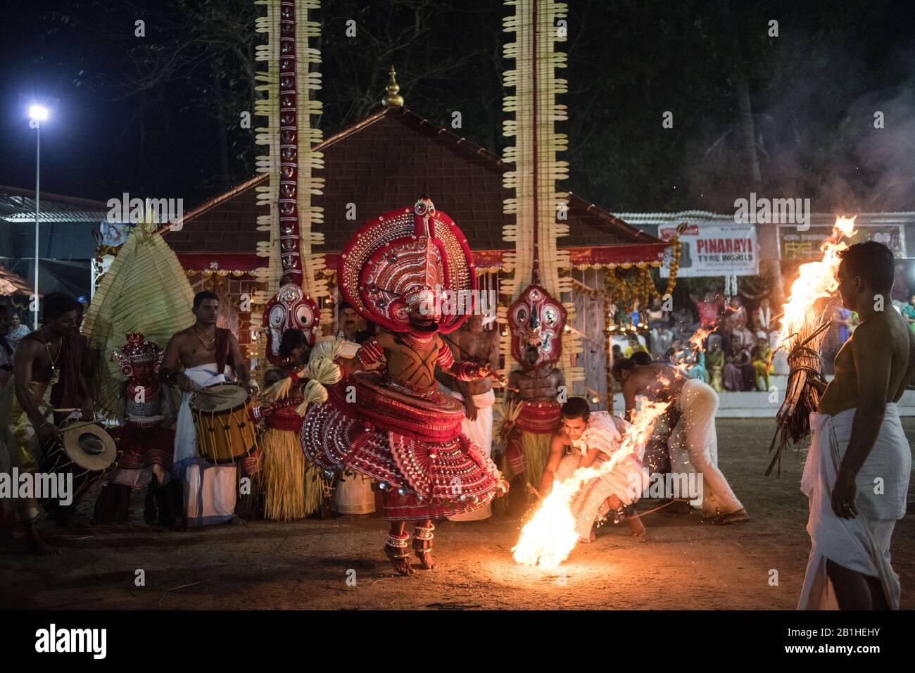 Theyyam performer, as a living god, dances a popular ritual form of ...