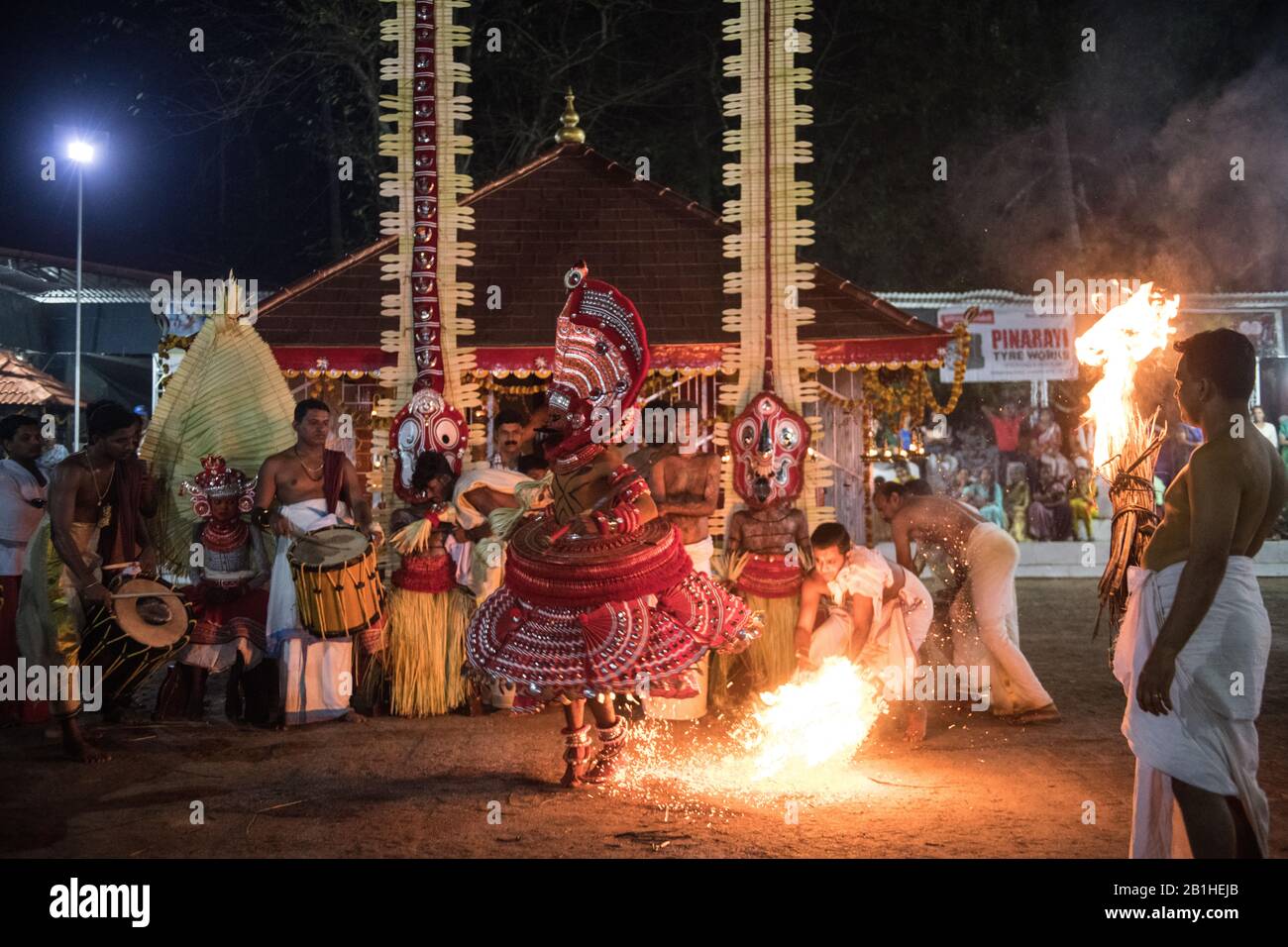 Theyyam performer, as a living god, dances a popular ritual form of ...