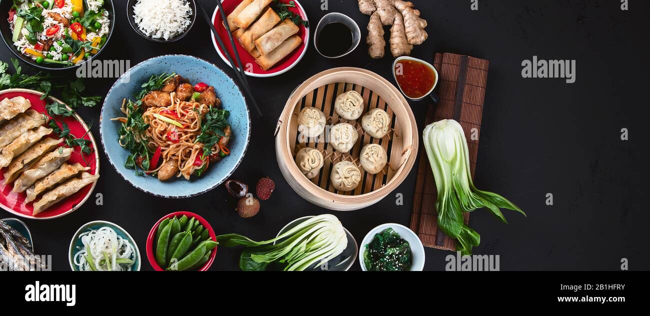 Assorted Chinese food on dark background. Asian food concept. Top view ...