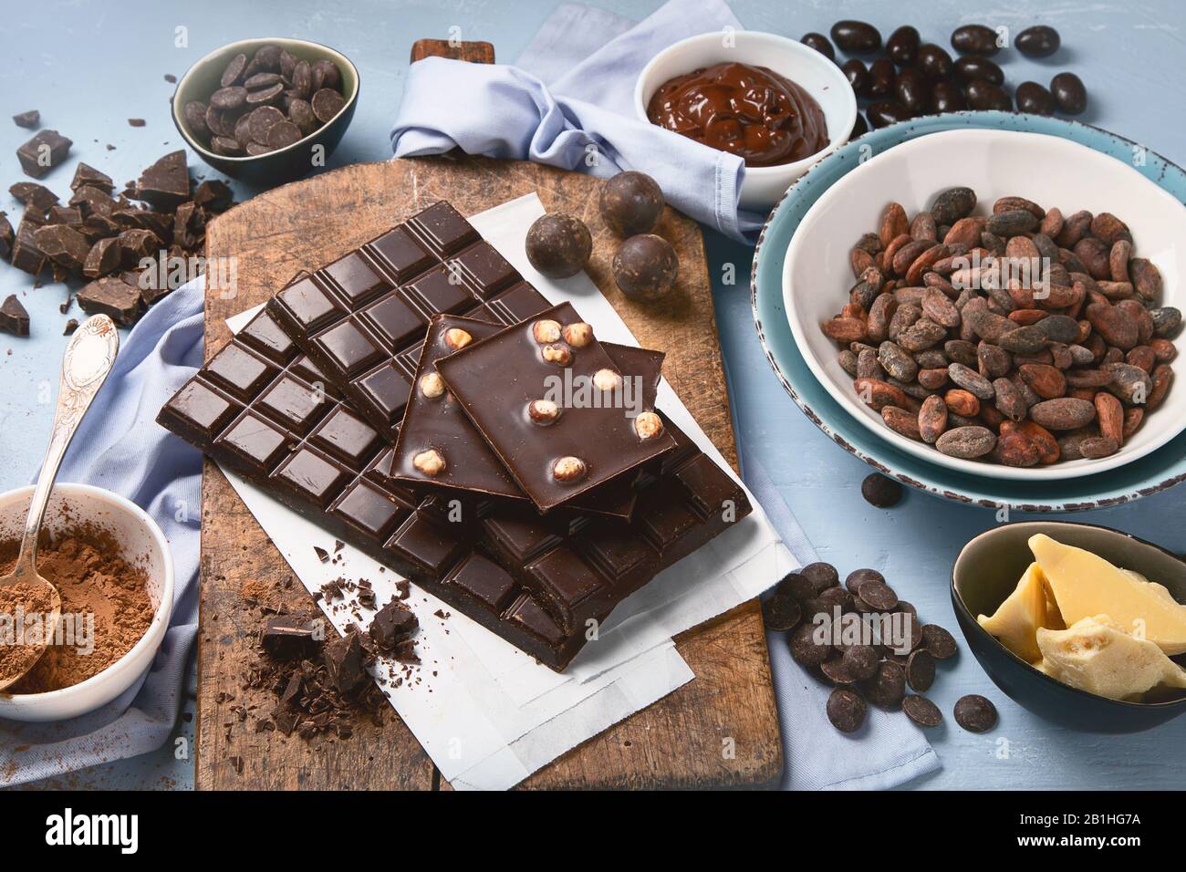 Dark bitter chocolate bars, cacao butter, cacao powder and cocoa beans ...