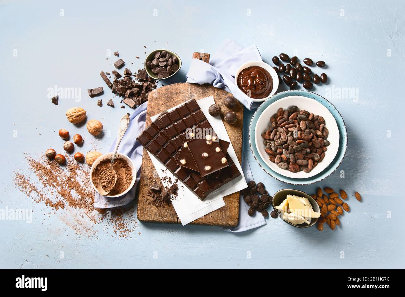 Dark bitter chocolate bars, cacao butter, cacao powder and cocoa beans ...