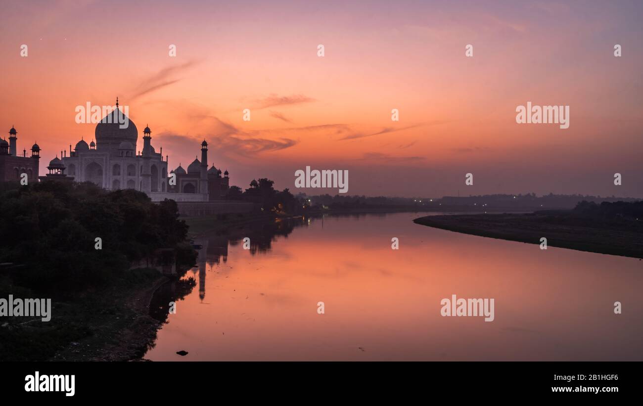 taj mahal seven wonder of india view at sunset with river and colorful ...