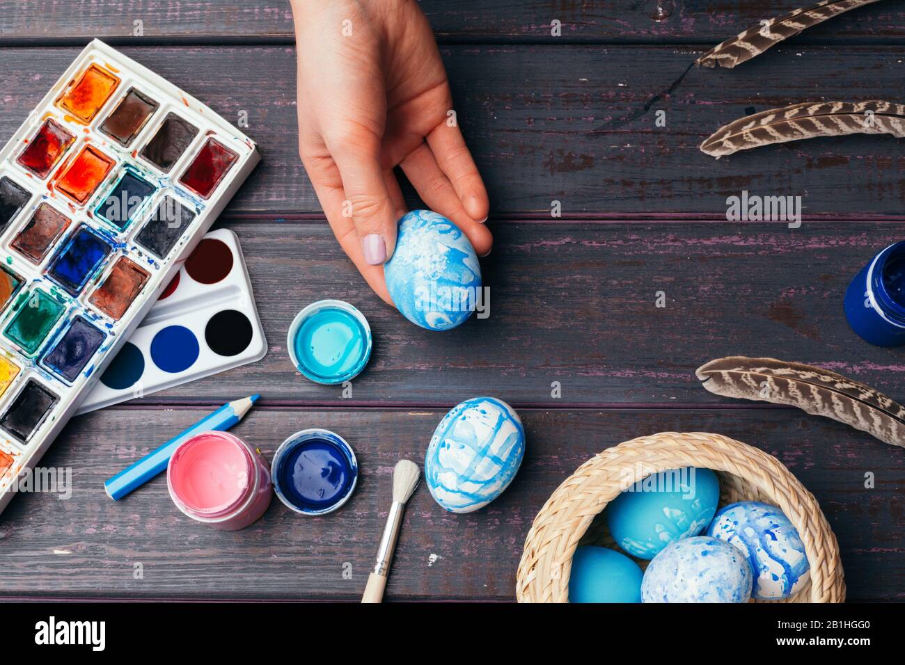 Female hands painting easter eggs hi-res stock photography and images ...