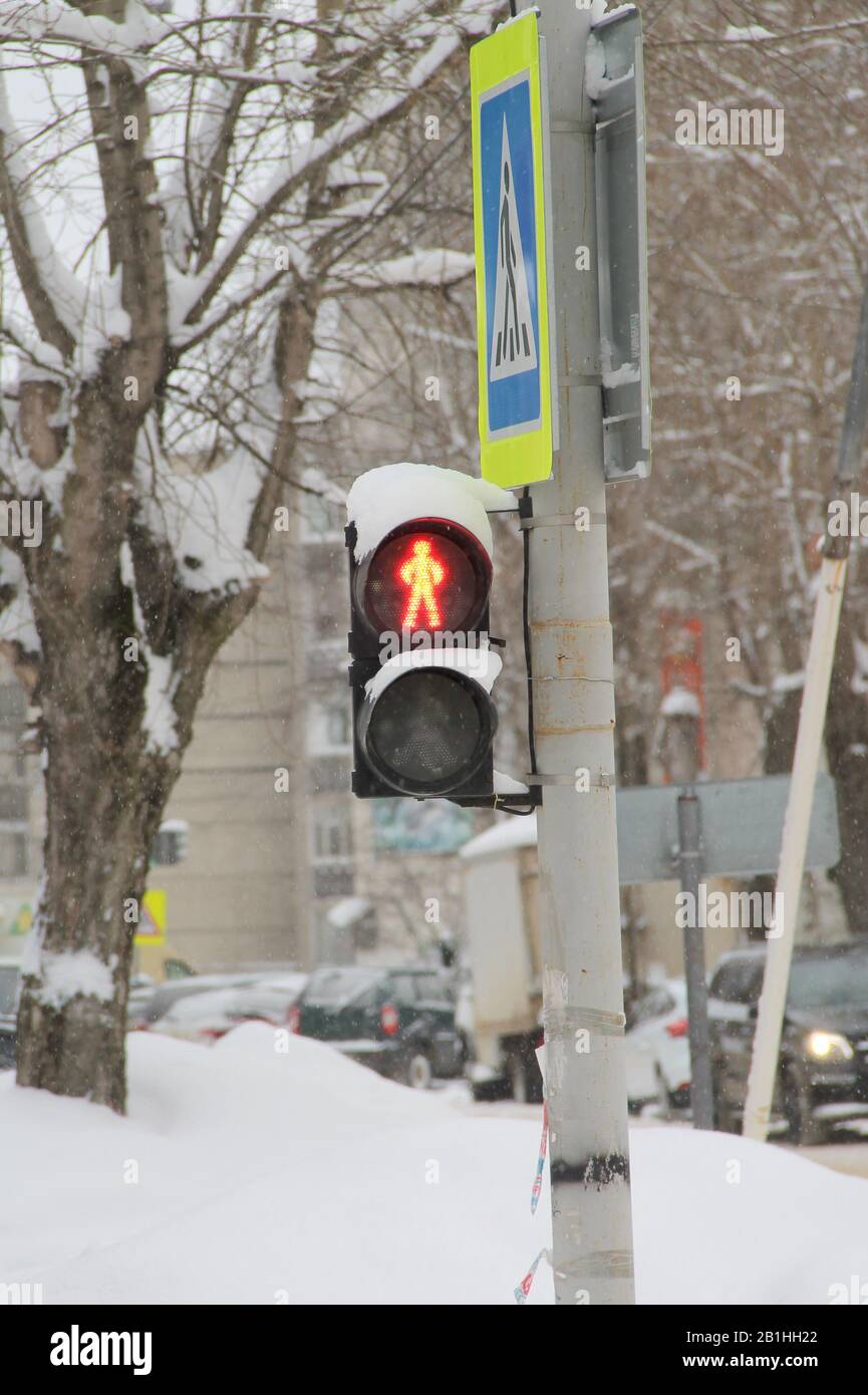 Traffic light for pedestrians with a red light in the shape of a human ...