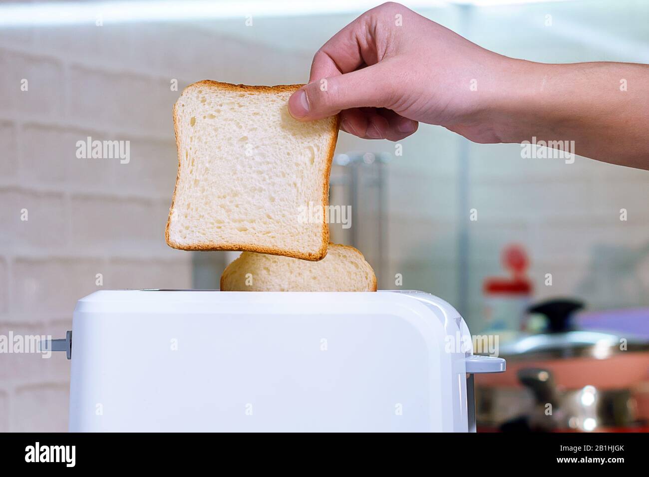 Making breakfast and toaster hi-res stock photography and images - Alamy