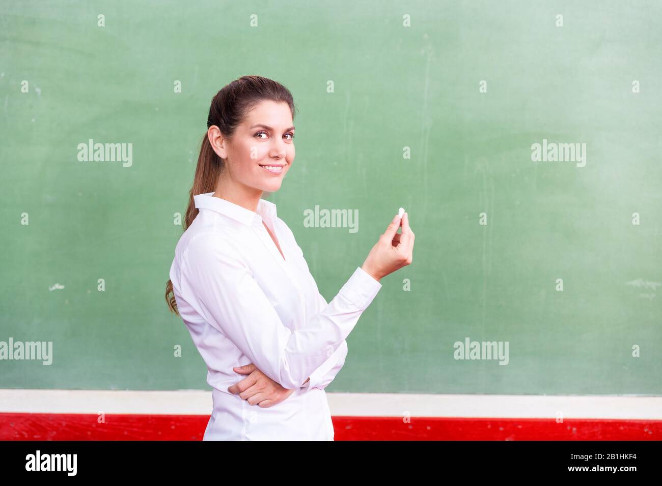 Young male teacher elementary hi-res stock photography and images - Alamy