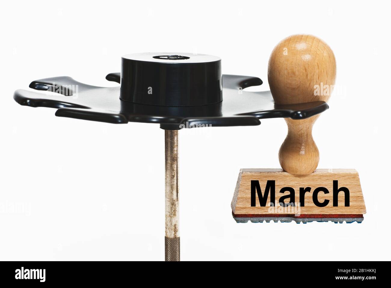 a stamp with the inscription March hangs in a stamp rack Stock Photo ...