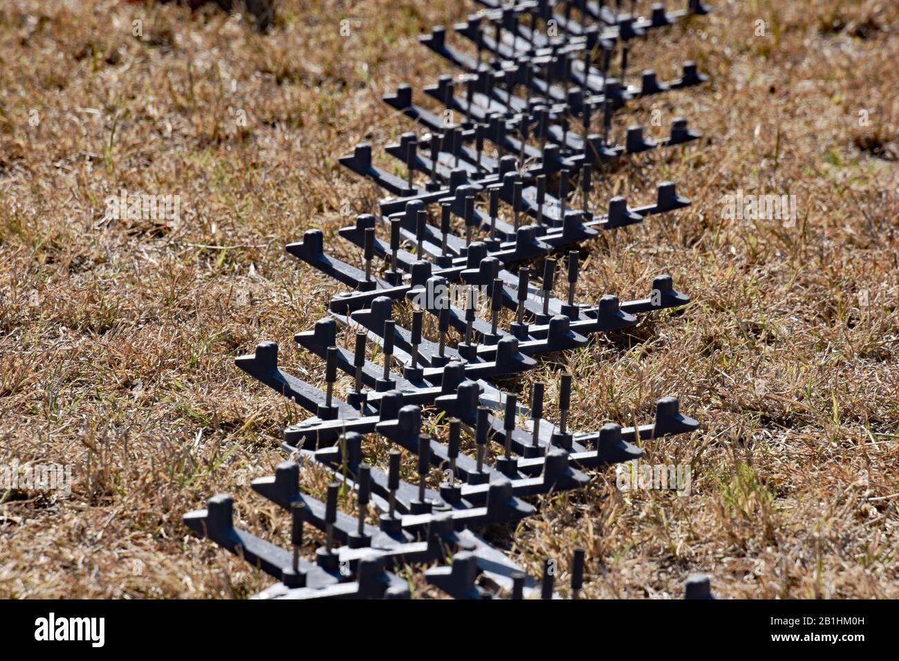 CAR WHEEL SPIKES Stock Photo - Alamy
