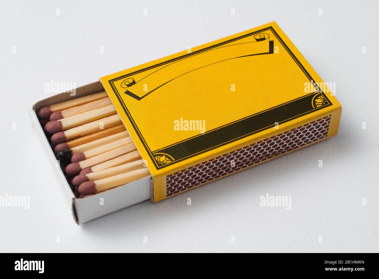 Be different concept: a blank yellow matchbox, with only one match ...