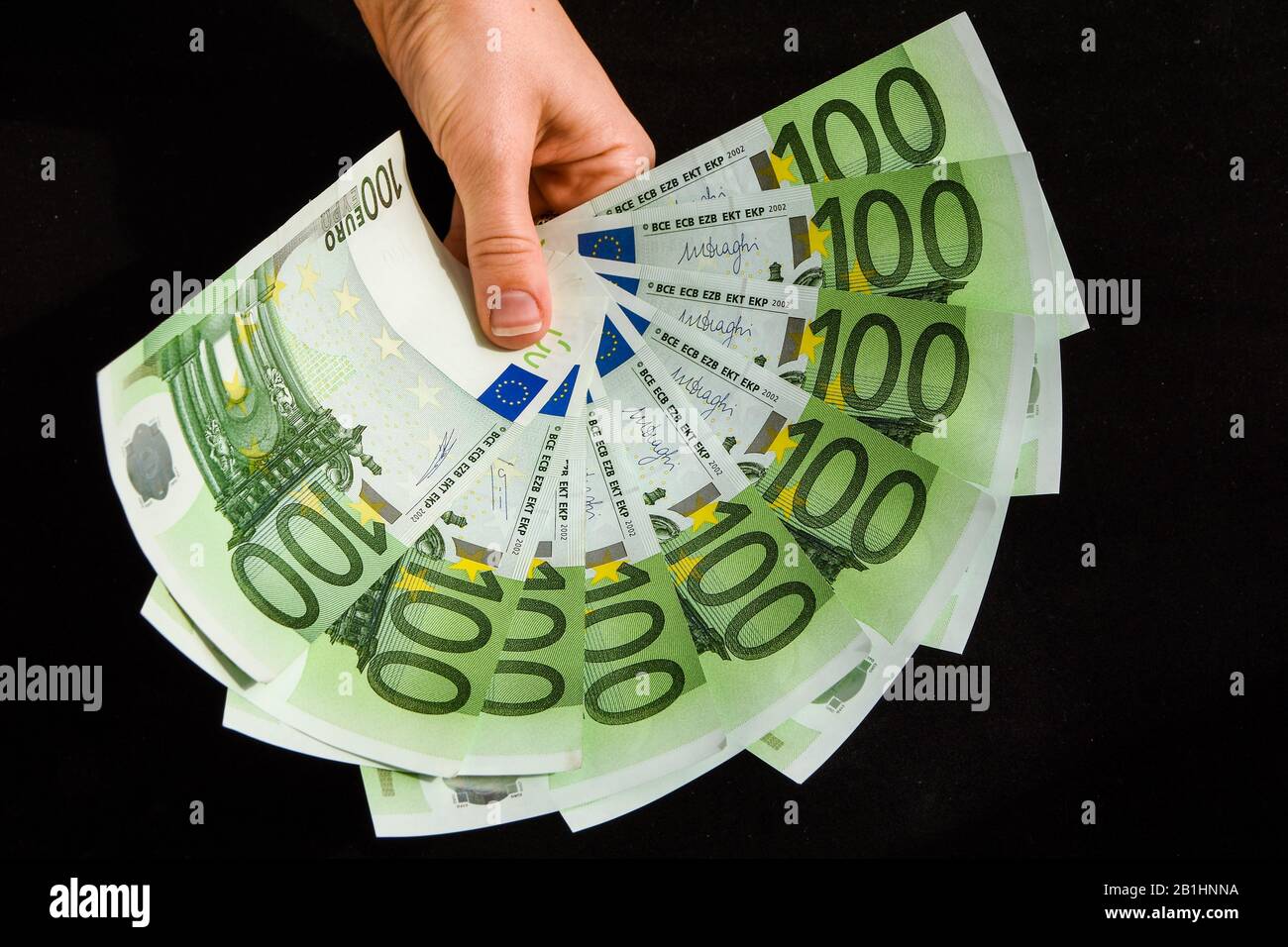 euro currency, european uninon money, hand holding euros cash on the ...