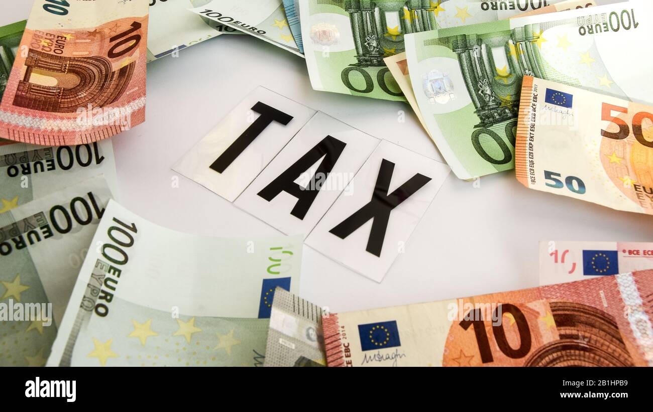 Euro Money Frame with Tax word inside on white background Stock Photo ...