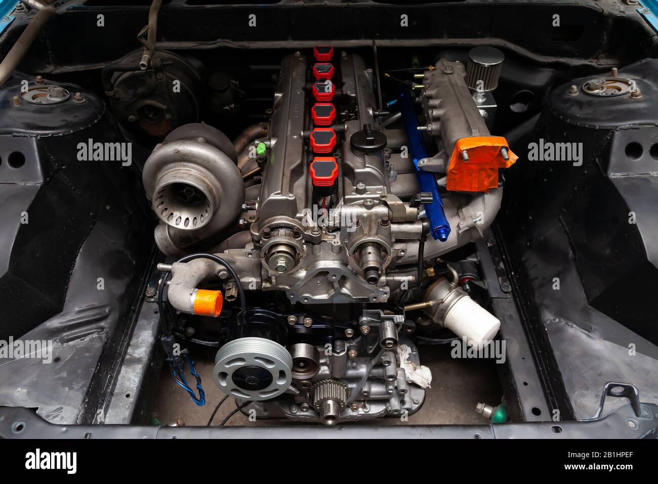 Powerful tuned gasoline engine with a turbocharger and a charger in the ...