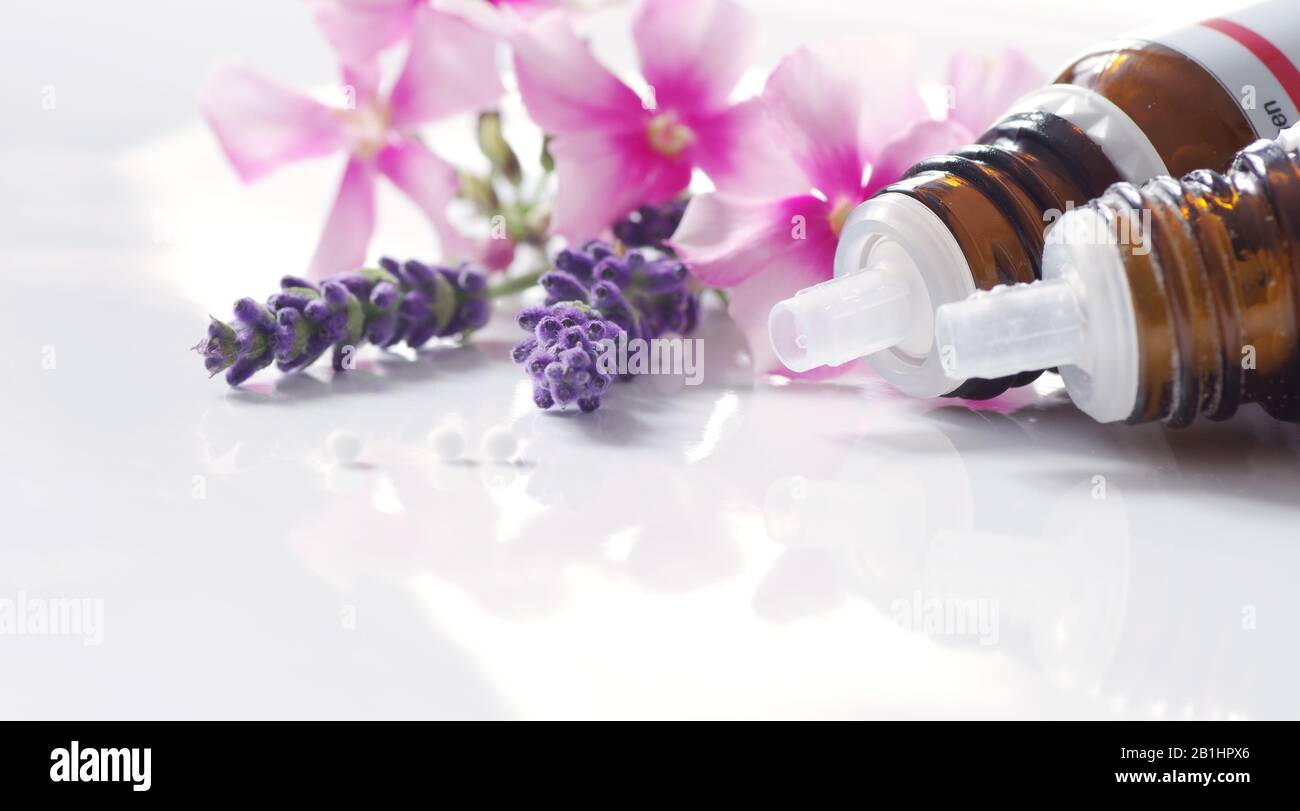 Homeopathy with flowers Stock Photo - Alamy