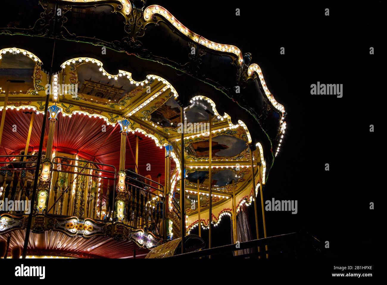 carousel merry-go-round with light at night Stock Photo - Alamy